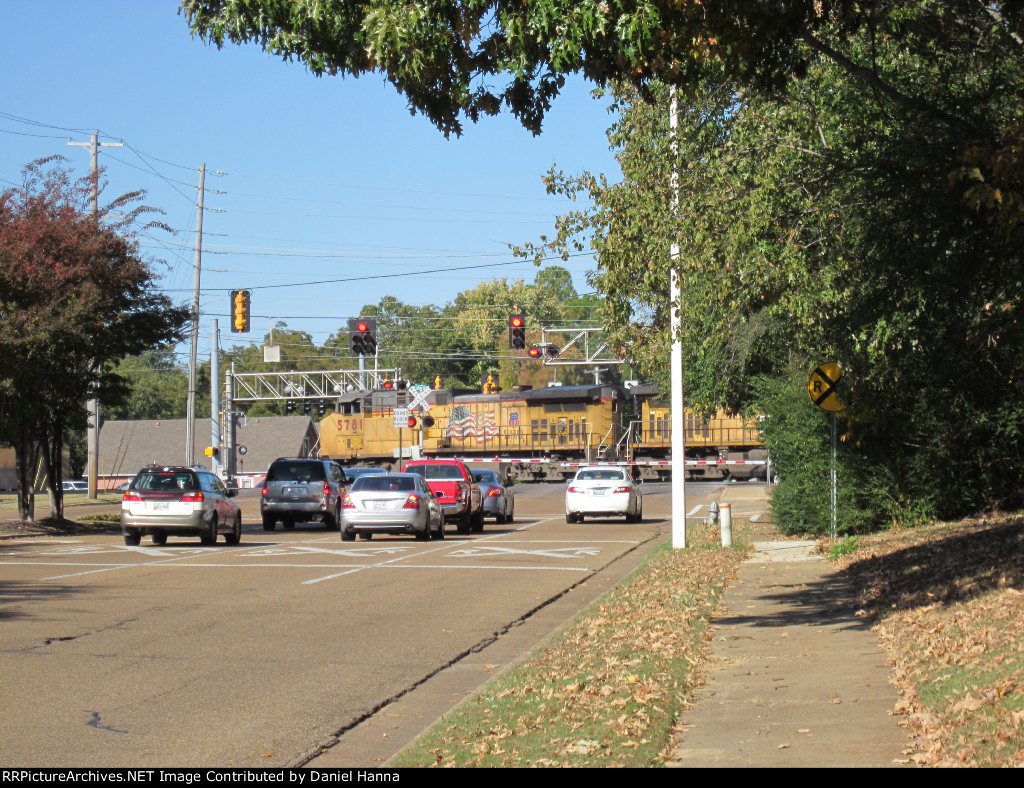 UP 5781 leads empty Scherer coal train